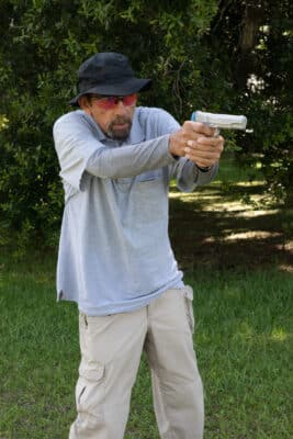 Strong-Side Pistol Draw Tactics from Closed Front Garments - The Armory ...